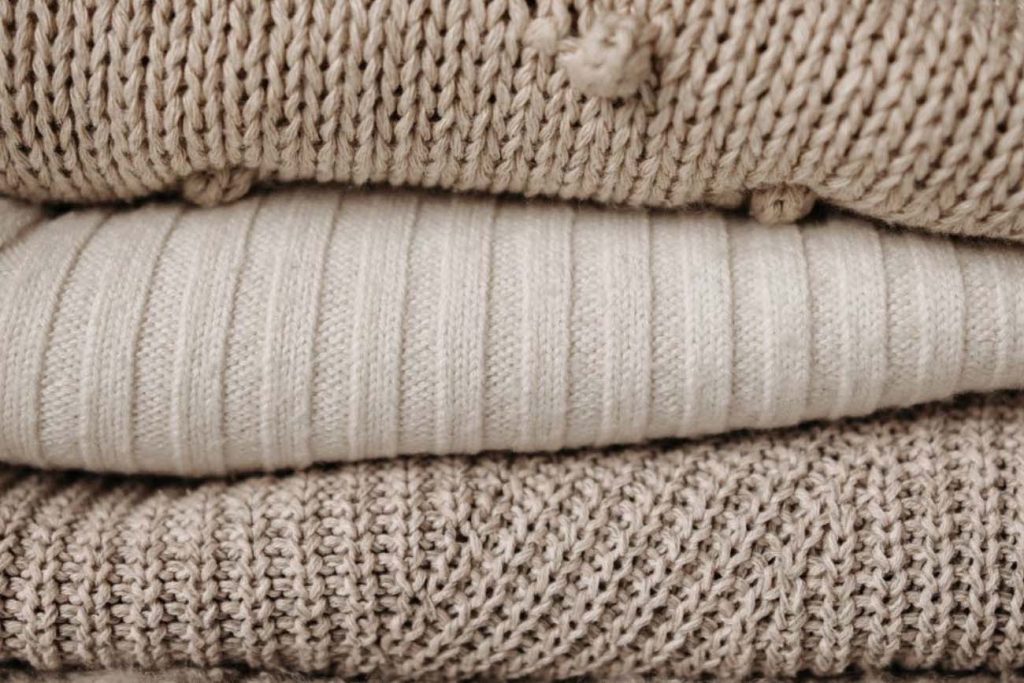 Unravelling the Rich History of Knitted Wool Jumpers on Jersey and ...